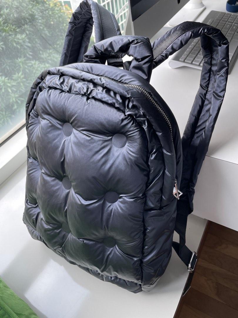 Cocoon puffy backpack, Luxury, Bags & Wallets on Carousell