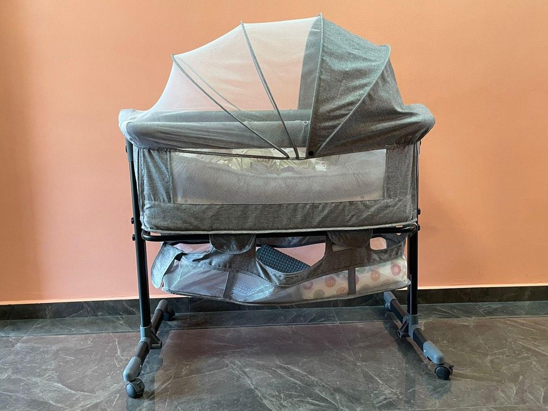 Baby rocking cot with storage & mosquito net, Babies & Kids, Baby ...