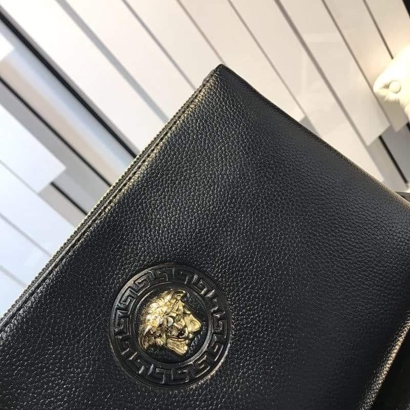 Versace men hand carry pouch bag, Luxury, Bags & Wallets on Carousell