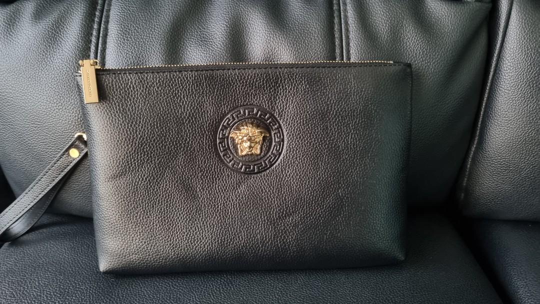 Versace men hand carry pouch bag, Luxury, Bags & Wallets on Carousell