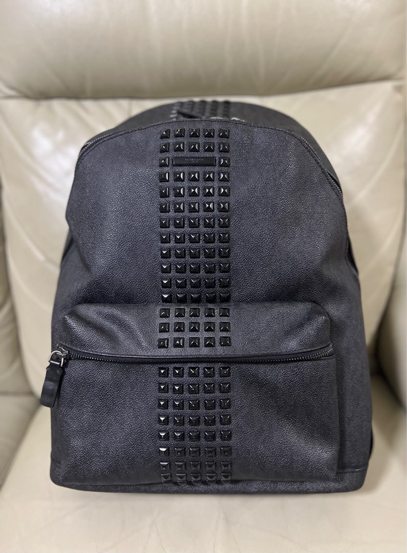 MK Backpack with black studs, Men's Fashion, Bags, Backpacks on Carousell