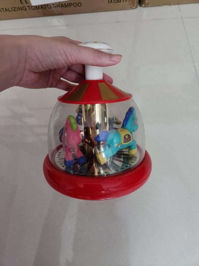 Top Tots Push and Spin Carousel, Hobbies & Toys, Toys & Games on Carousell