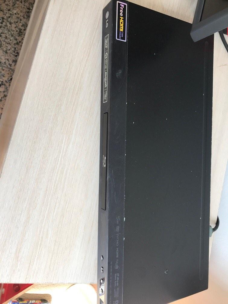 LG DVD player with assorted movies, TV & Home Appliances, TV ...