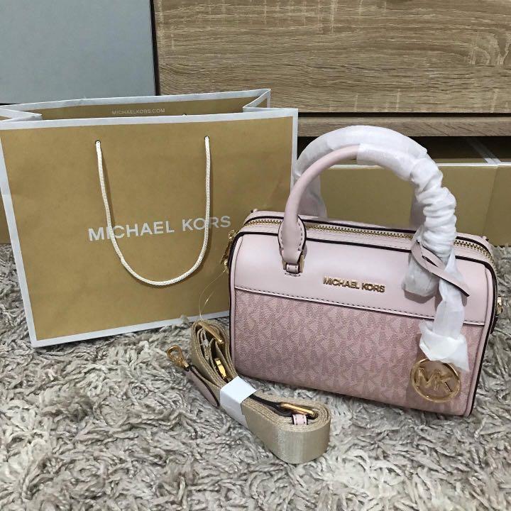Mk mini duffle in powder blush, Women's Fashion, Bags & Wallets, Cross ...
