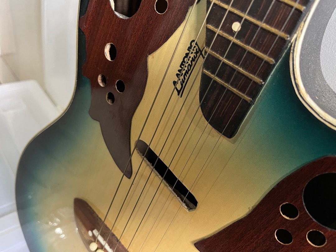 ORIGINAL Lumanog Guitar with capo, Hobbies & Toys, Music & Media, CDs ...