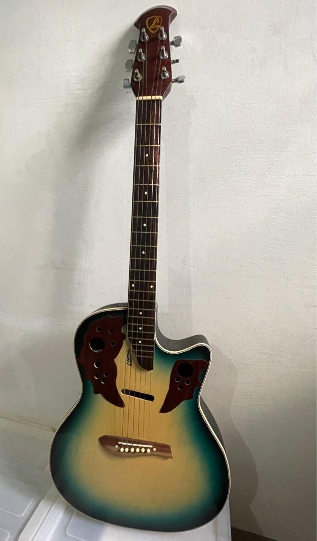 ORIGINAL Lumanog Guitar with capo, Hobbies & Toys, Music & Media, CDs ...