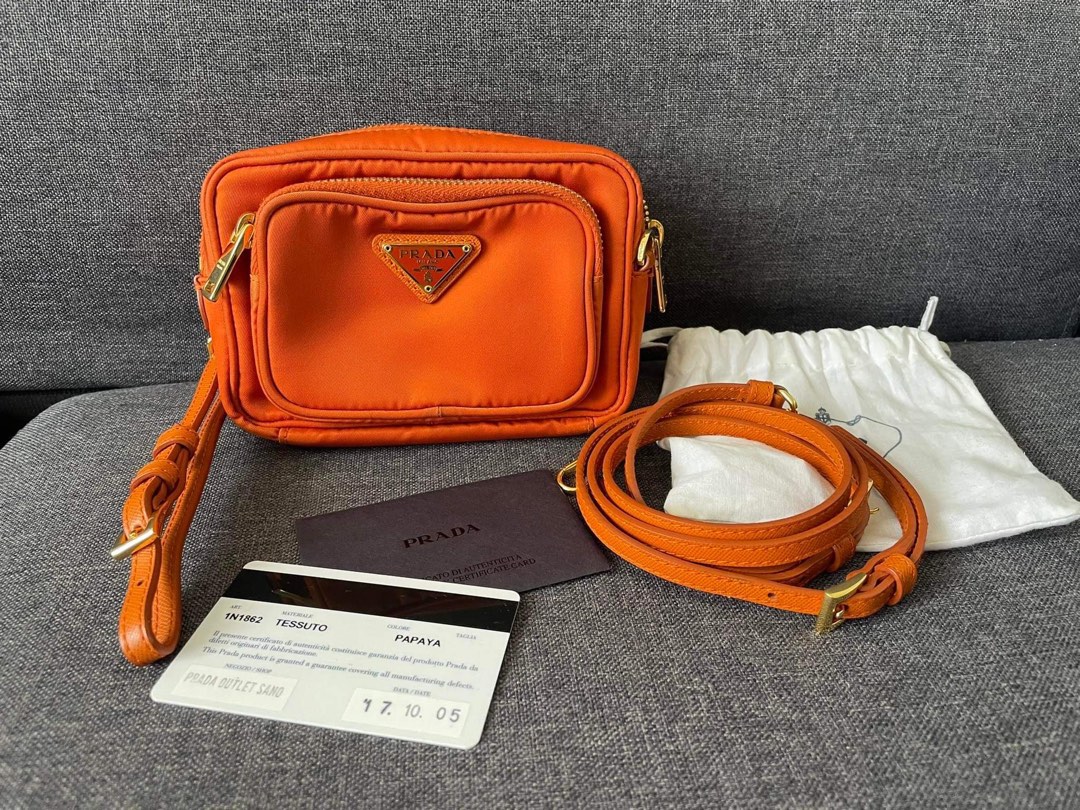 Prada Tessuto Mini Sling, Luxury, Bags & Wallets on Carousell