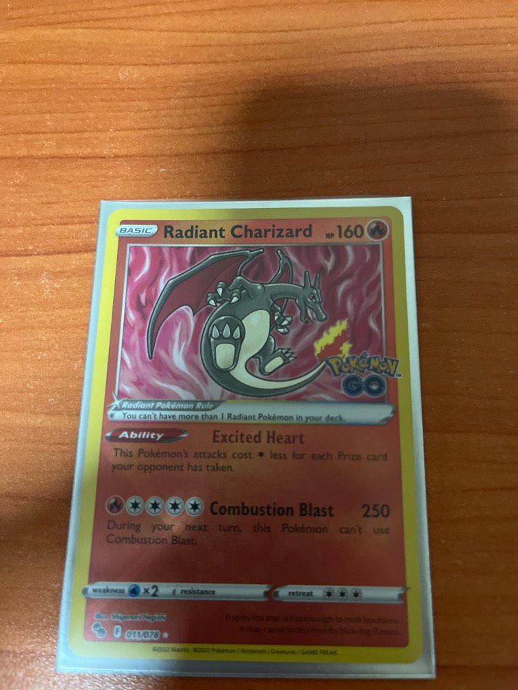 Radiant charizard, Hobbies & Toys, Toys & Games on Carousell