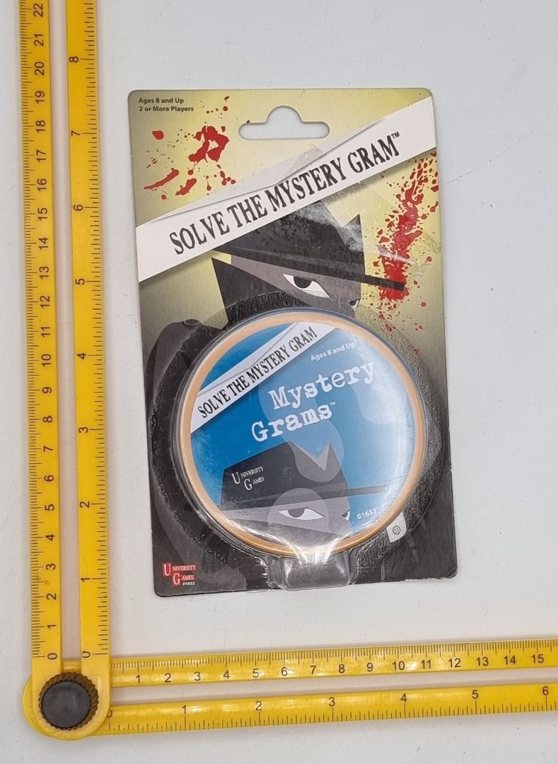 UNIVERSITY GAMES Solve the Mystery Grams Mystery Teasers Guessing Game ...