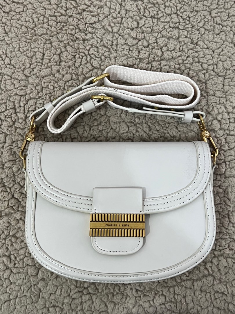 charles and keith wide strap saddle bag, Women's Fashion, Bags & Wallets, Cross-body Bags on ...