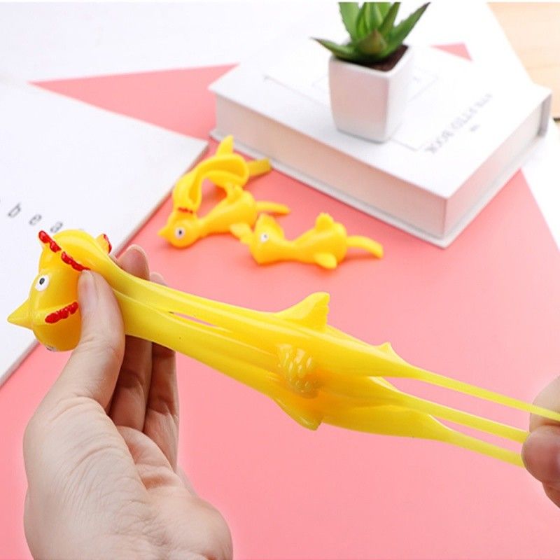 Chicken flying catapult toy flying catapult chicken rubber silicon toy ...