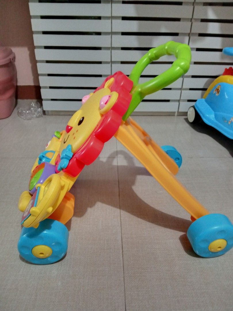 Fisher Price Musical Lion Push Walker, Babies & Kids, Infant Playtime ...