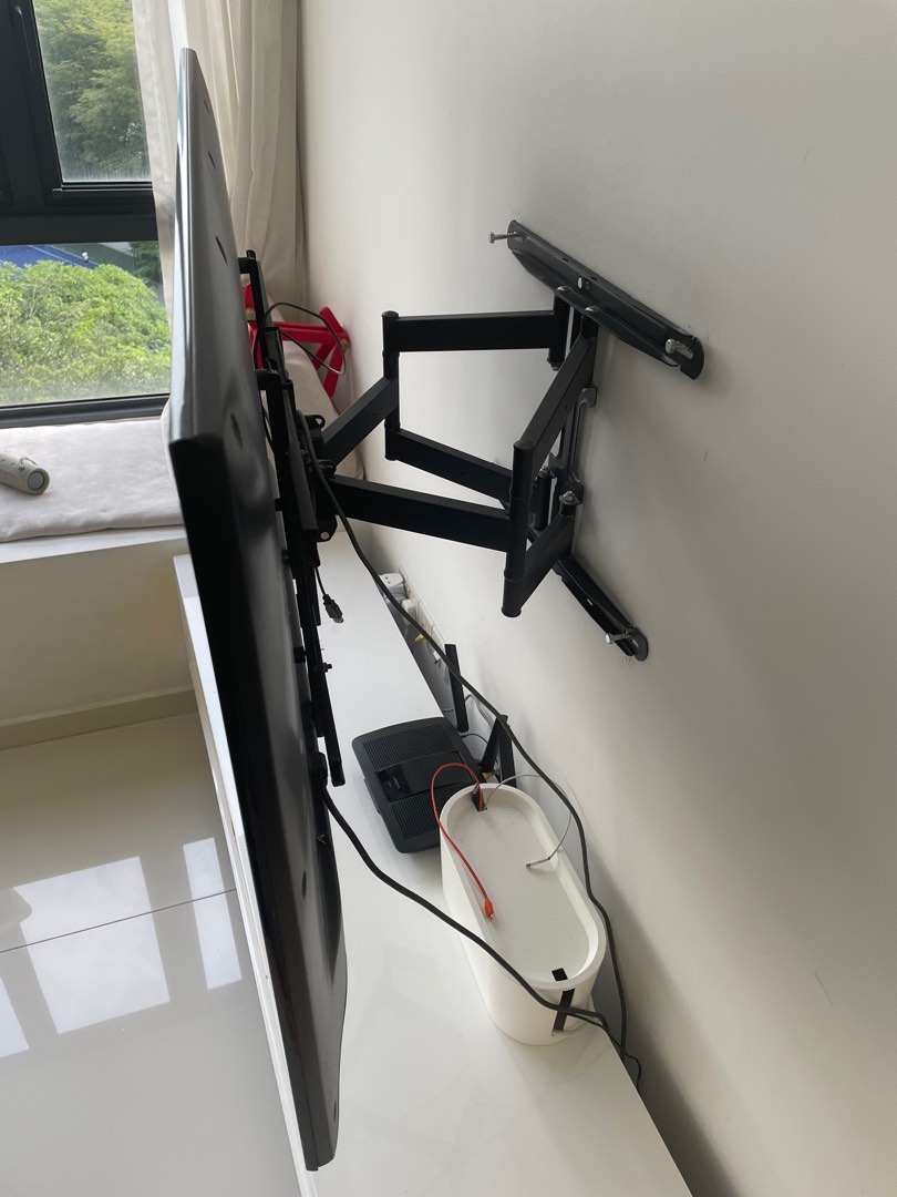 Rotating tv wall mount up to 65, Everything Else on Carousell