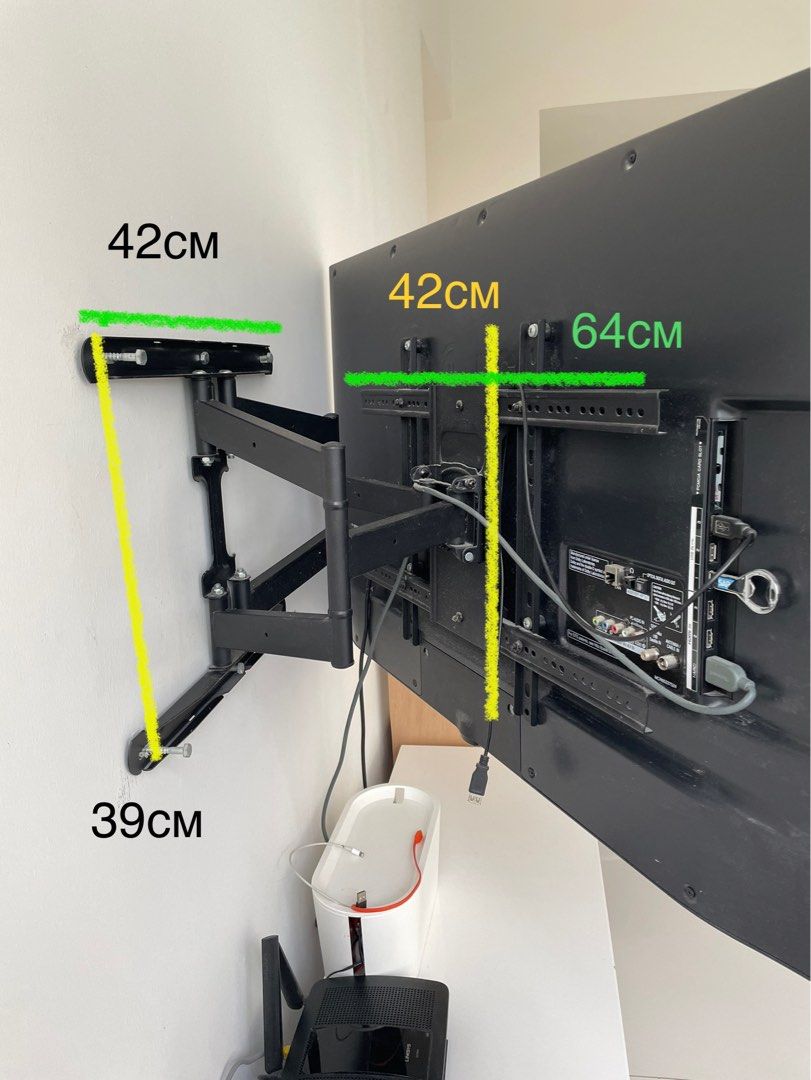 Rotating tv wall mount up to 65, Everything Else on Carousell
