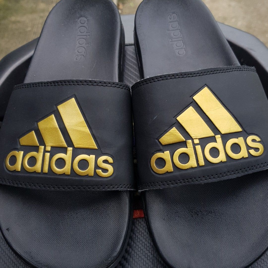 Adidas Adillette black and gold, Men's Fashion, Footwear, Slippers & Slides on Carousell