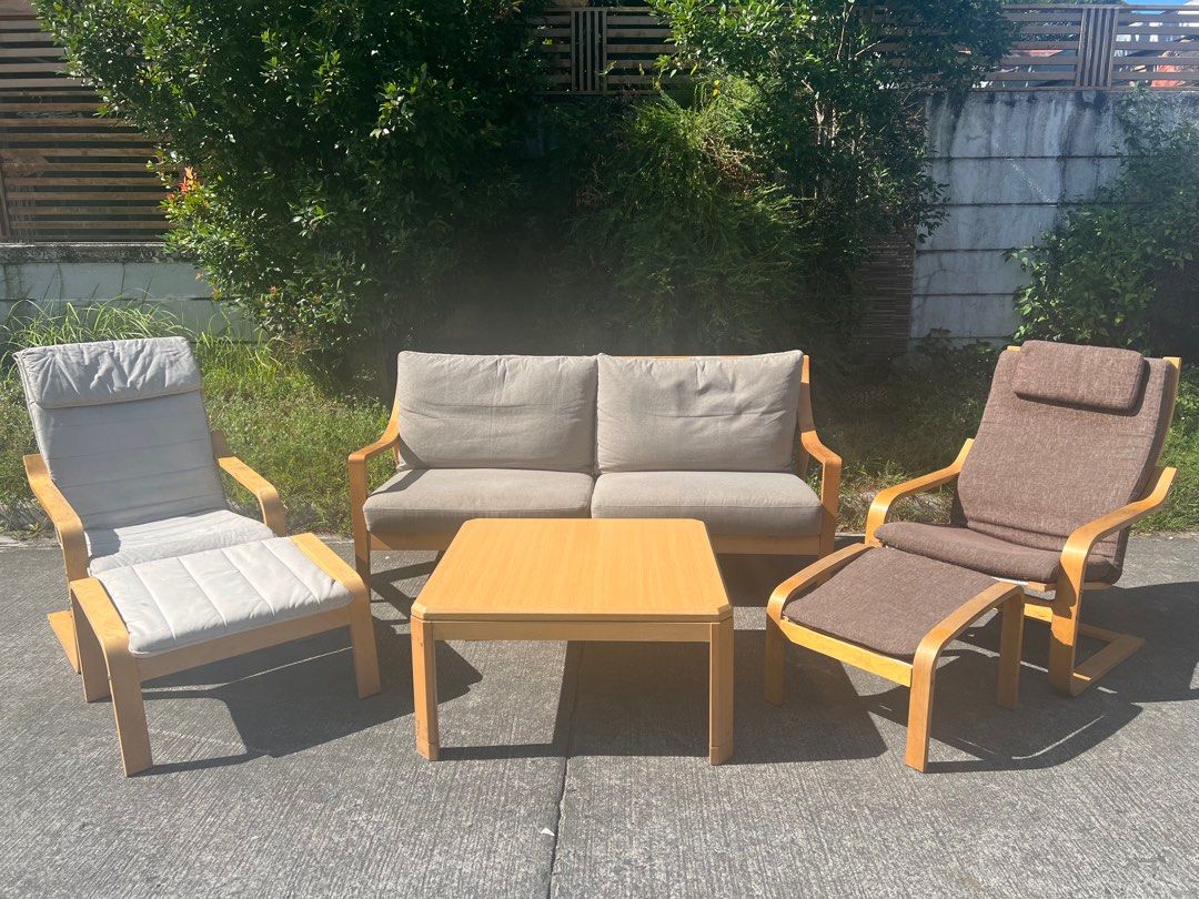 Scandenavian style 3 seater sofa and IKEA racking chairs with ottoman ...