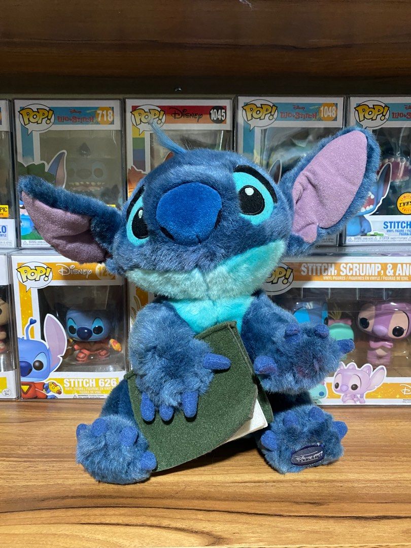 Disney Exclusive Stitch with book, Hobbies & Toys, Toys & Games on ...
