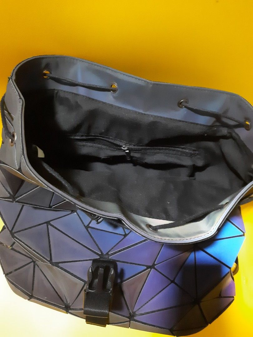 Triangle designs backpack, Men's Fashion, Bags, Backpacks on Carousell