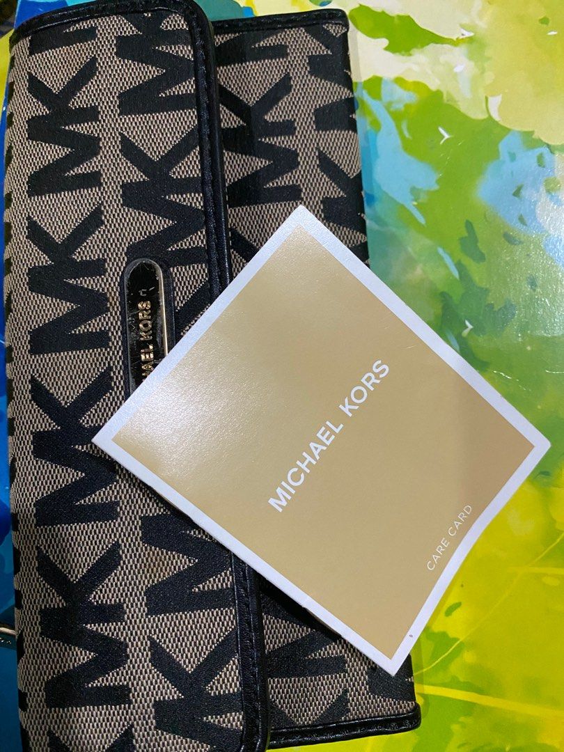 Michael Kors slim wallet, Luxury, Bags & Wallets on Carousell