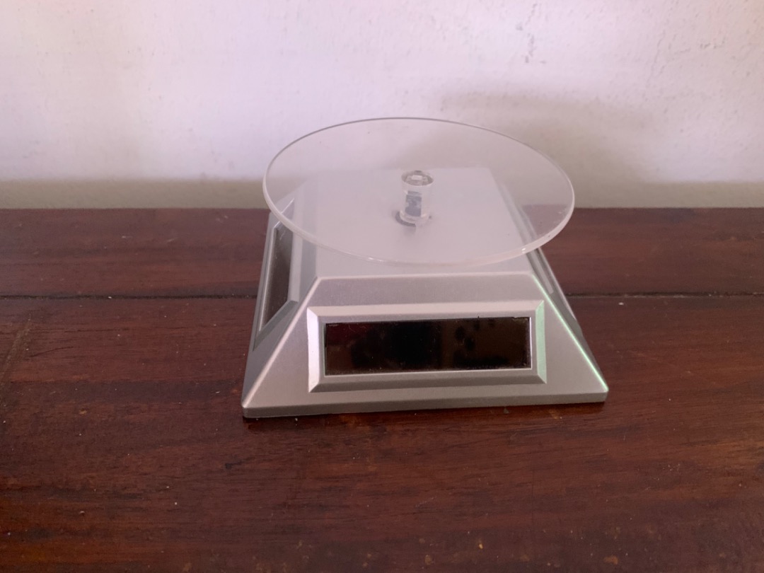 Revolving rotating glass Display stand battery operated turn around ...