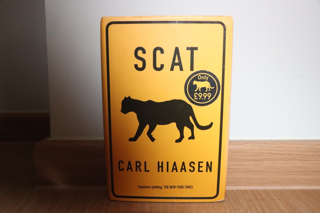 Scat by Carl Hiaasen, Hobbies & Toys, Books & Magazines, Fiction & Non-Fiction on Carousell
