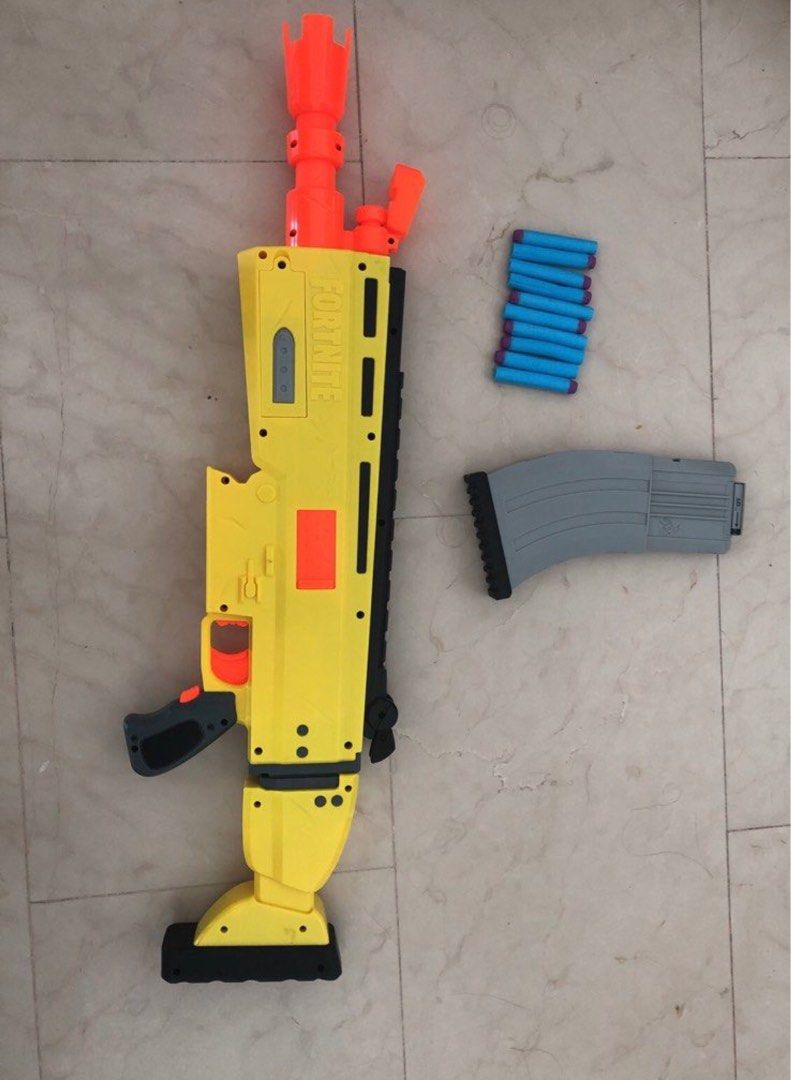 Fortnite gun with bullets., Hobbies & Toys, Toys & Games on Carousell
