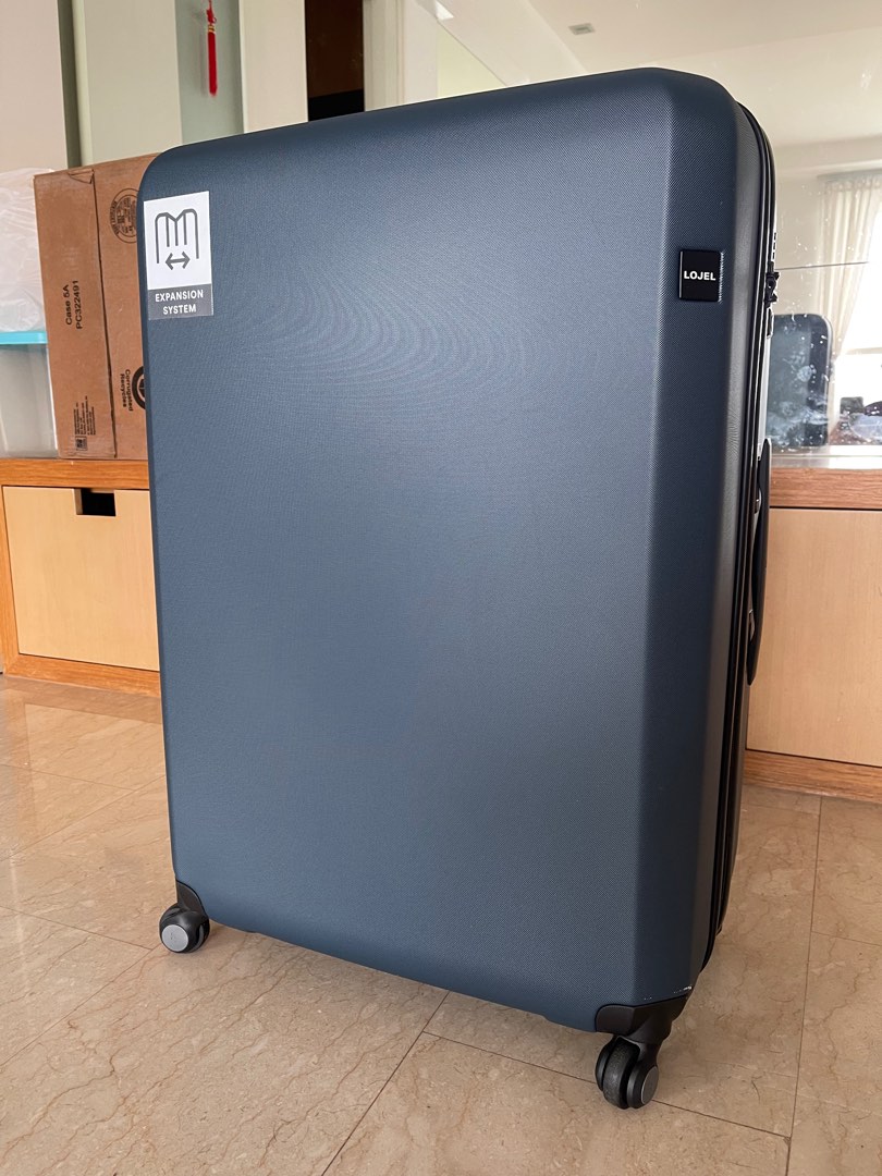 L size Lojel luggage, Blue, expandable, dimensions excluding wheels are 70cm H x 50cm W x 30cm D ...