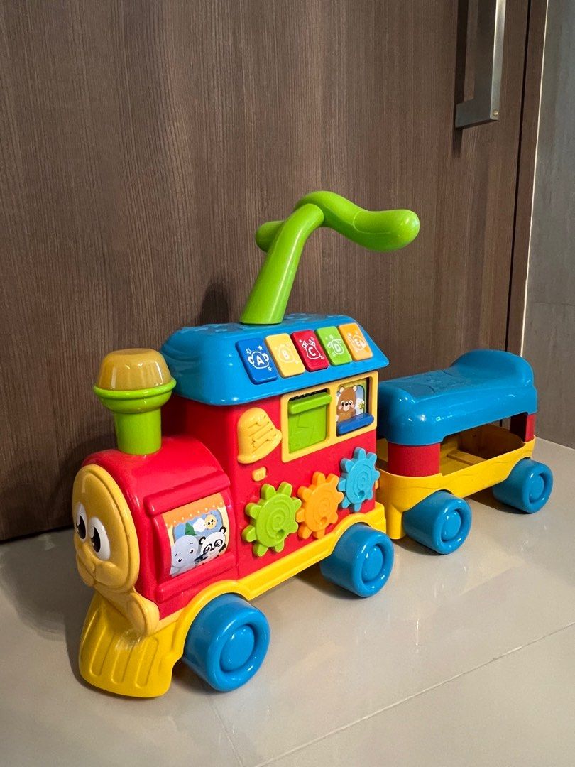 Push and ride alphabet train, Babies & Kids, Infant Playtime on Carousell