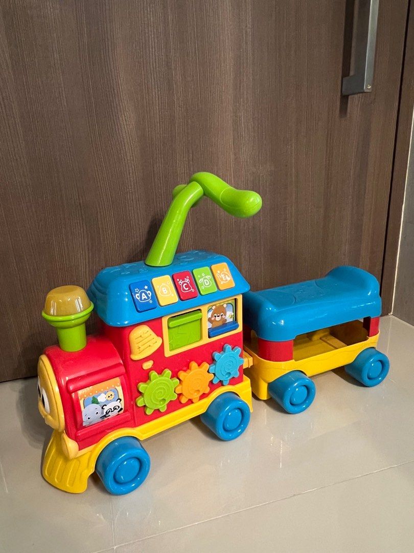 Push and ride alphabet train, Babies & Kids, Infant Playtime on Carousell