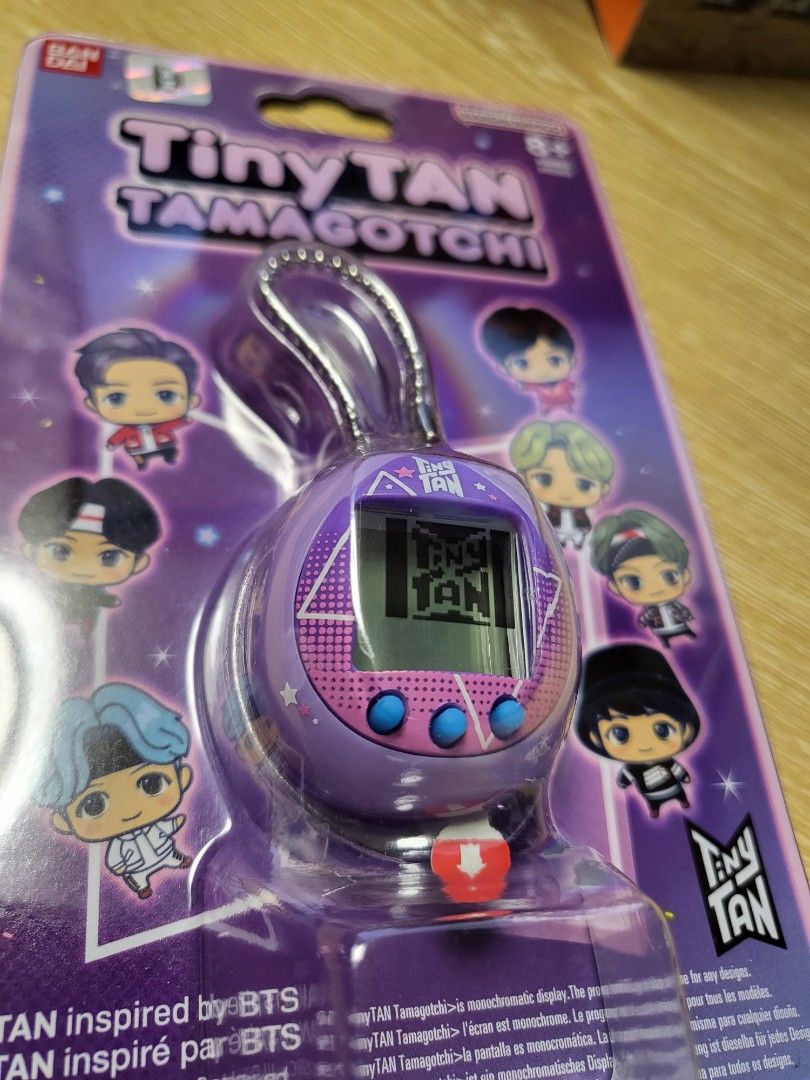 Tiny Tan Tamagotchi (purple), Hobbies & Toys, Toys & Games on Carousell
