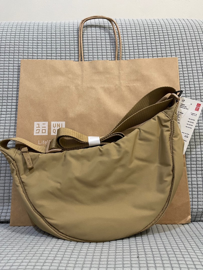 Uniqlo Dumpling bag, Women's Fashion, Bags & Wallets, Cross-body Bags ...