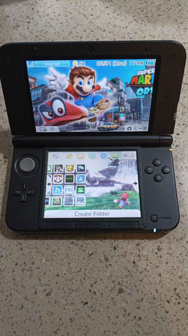 Modded Nintendo 3DS XL with 16/64/128GB storage options. charging cable ...