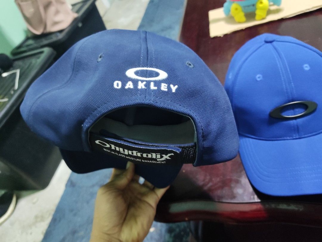 Oakley cap, Men's Fashion, Tops & Sets, Hoodies on Carousell