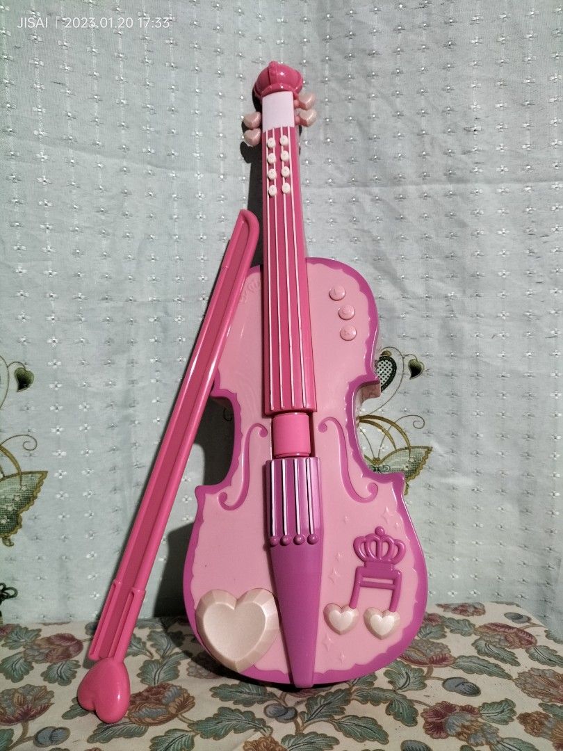 RARE Tamagotchi Melodytchi's Violin, Hobbies & Toys, Toys & Games on Carousell