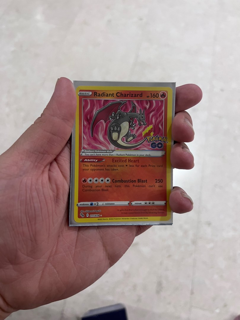 Radiant charizard, Hobbies & Toys, Toys & Games on Carousell