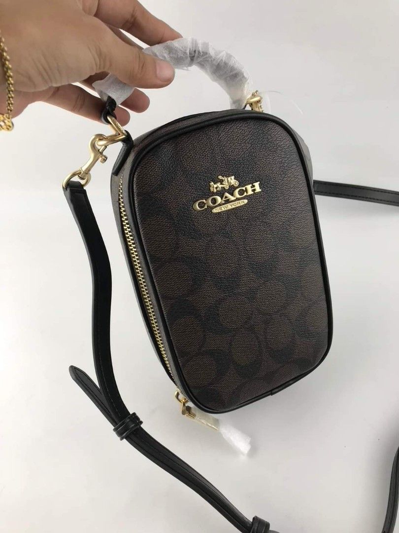 Coach Eva Phone Sling in Signature Canvas, Women's Fashion, Bags ...