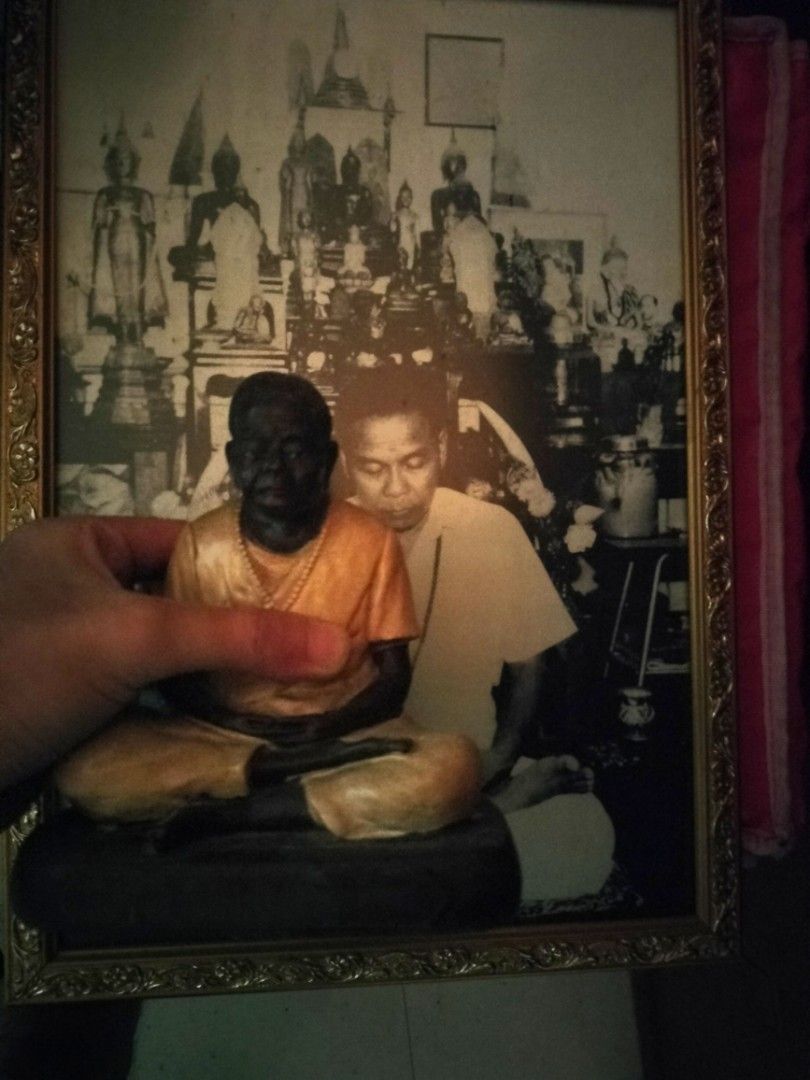 Ajarn Tongtao Wat Kao Or 2534with below embed alot of old Amulets.and ...