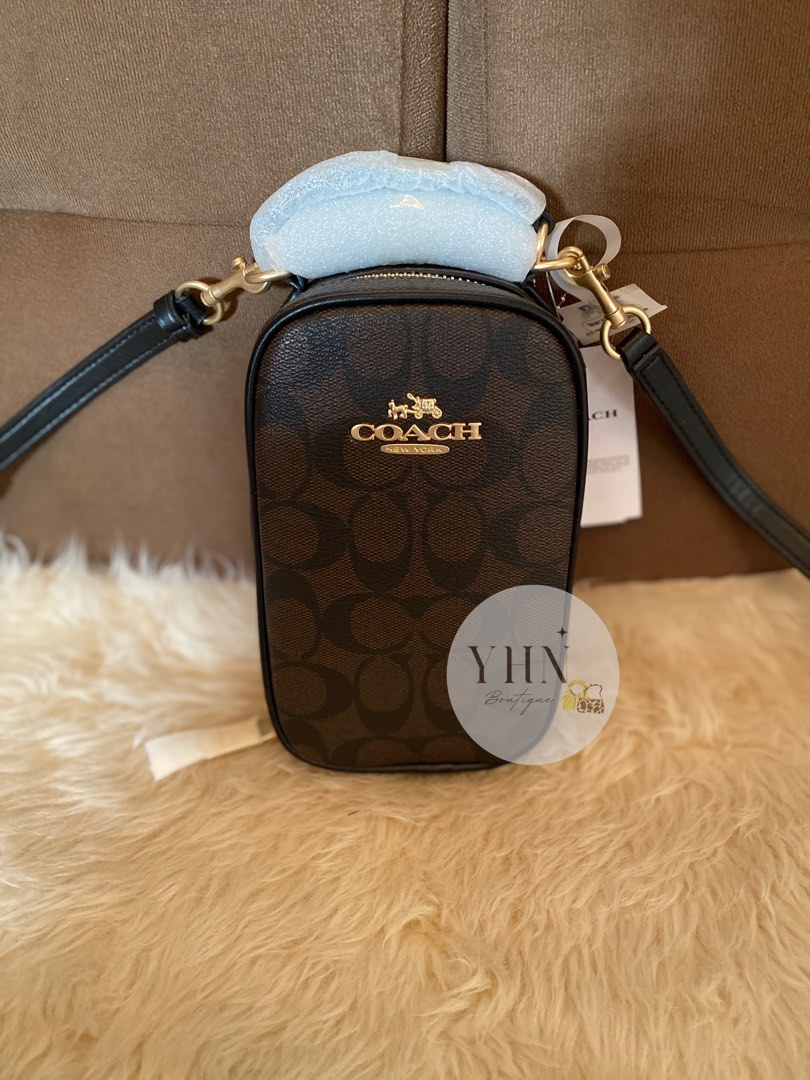 Coach eva phone crossbody, Luxury, Bags & Wallets on Carousell
