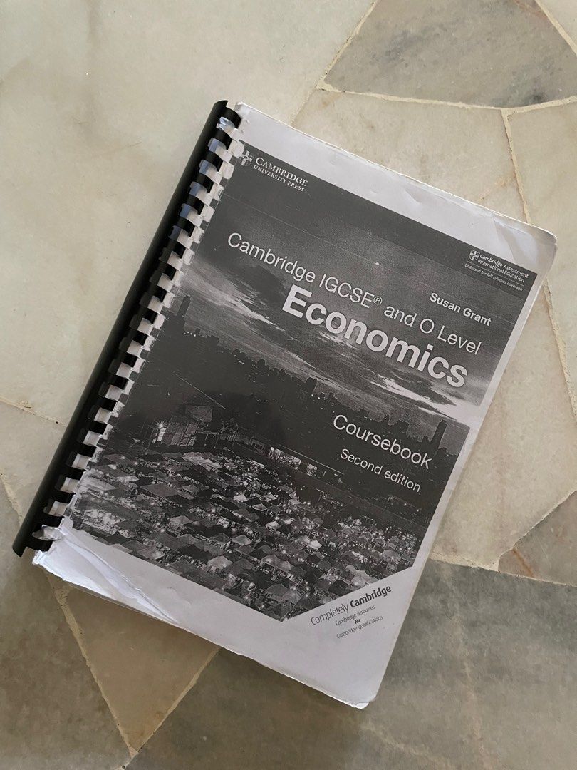 IGCSE economics textbook (lots of notes inside book), Hobbies & Toys ...