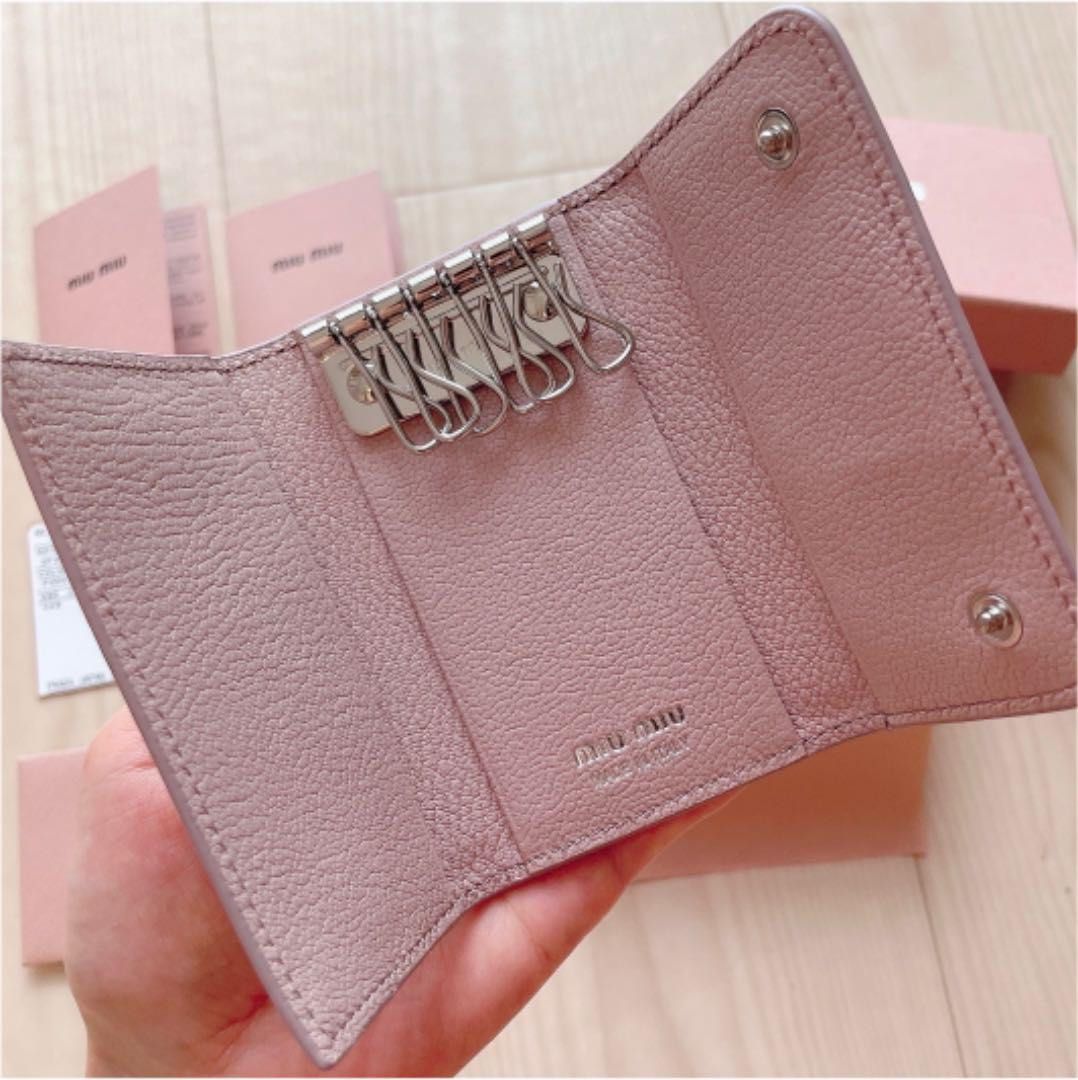 miu miu pearl key holder, Luxury, Bags & Wallets on Carousell