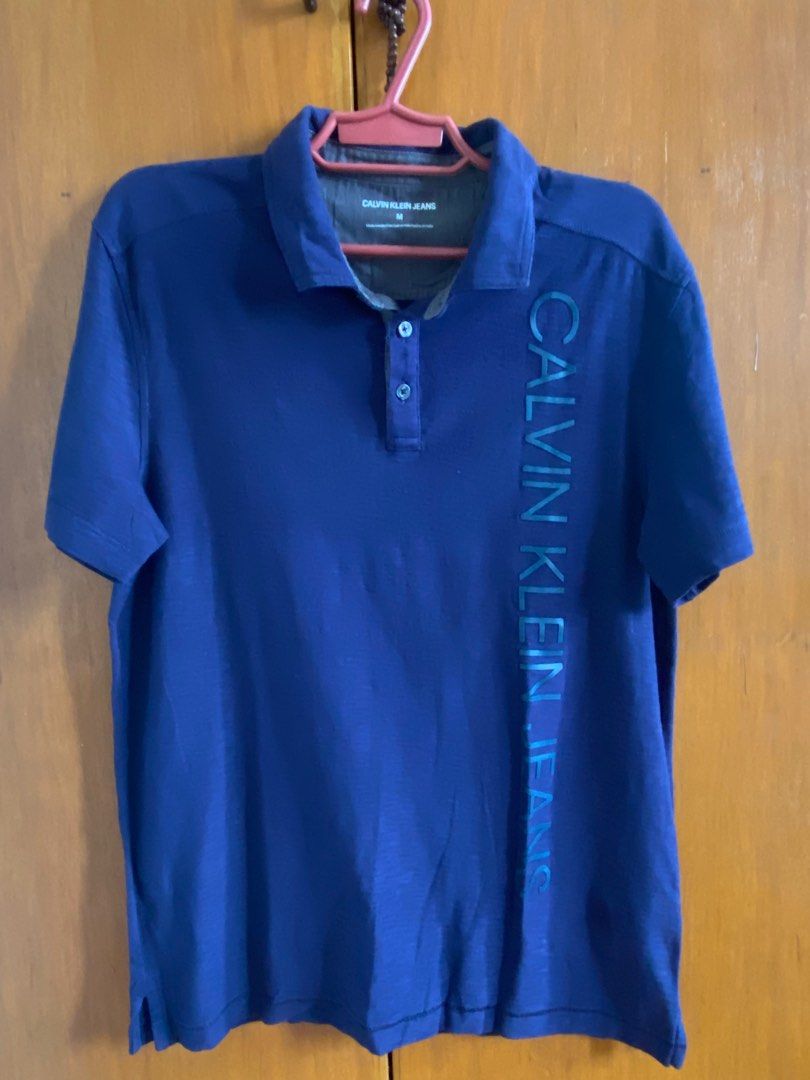 Calvin Klein Polo shirt for men (medium), Men's Fashion, Tops & Sets, Tshirts & Polo Shirts on ...