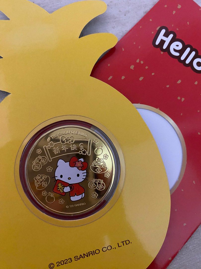 Hello kitty gold coin, Everything Else on Carousell