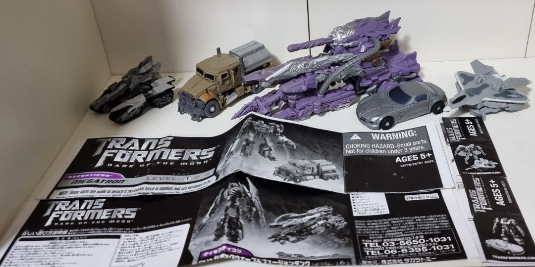 Transformers movie rotf megatron, dotm megatron, takara cv-19 shockwave ...