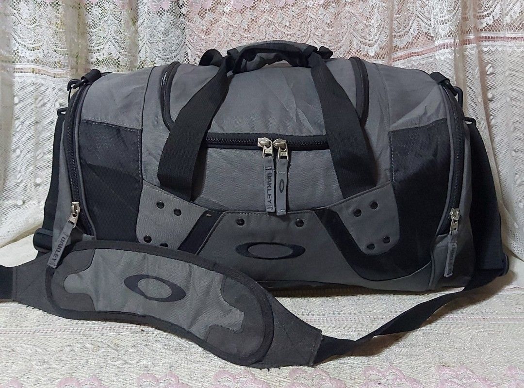 Oakley duffel, Men's Fashion, Bags, Sling Bags on Carousell