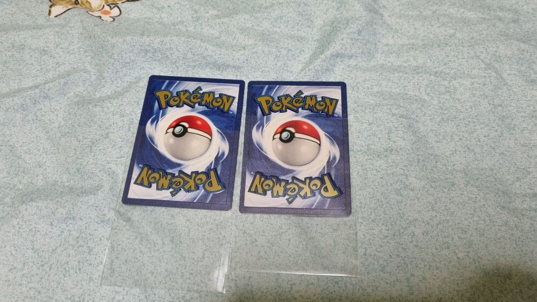 Pokemon TCG 25th Anniversary Metal Charizard Metal Pikachu, Hobbies ...