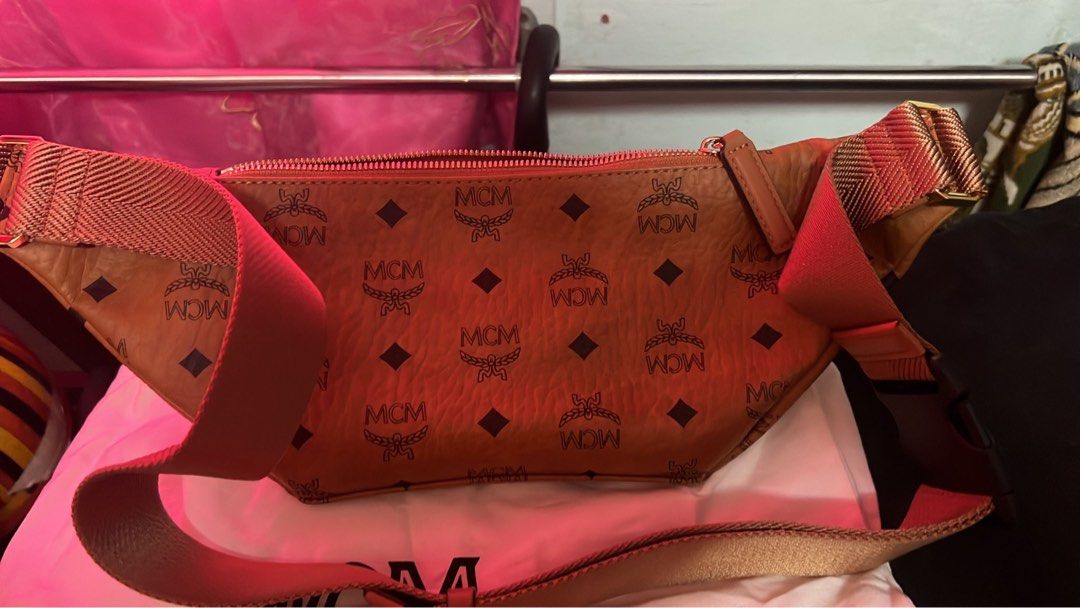 MCM pouch beg, Luxury, Bags & Wallets on Carousell
