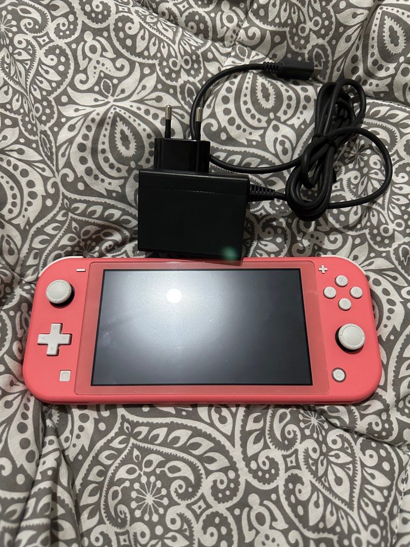Coral pink Nintendo Switch lite, Video Gaming, Video Game Consoles ...