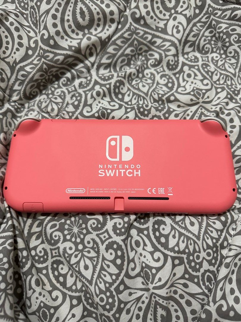 Coral pink Nintendo Switch lite, Video Gaming, Video Game Consoles ...