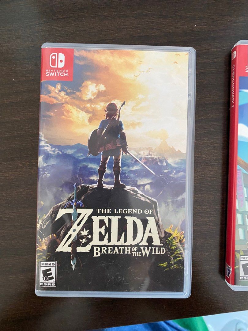 Nintendo Switch OLED + 2 games (Zelda BOTW & Overcooked 2), Video ...