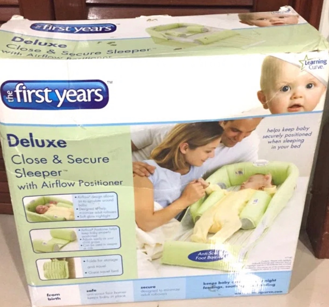 The First Years Deluxe Close & Secure Sleeper With Airflow Positioner ...